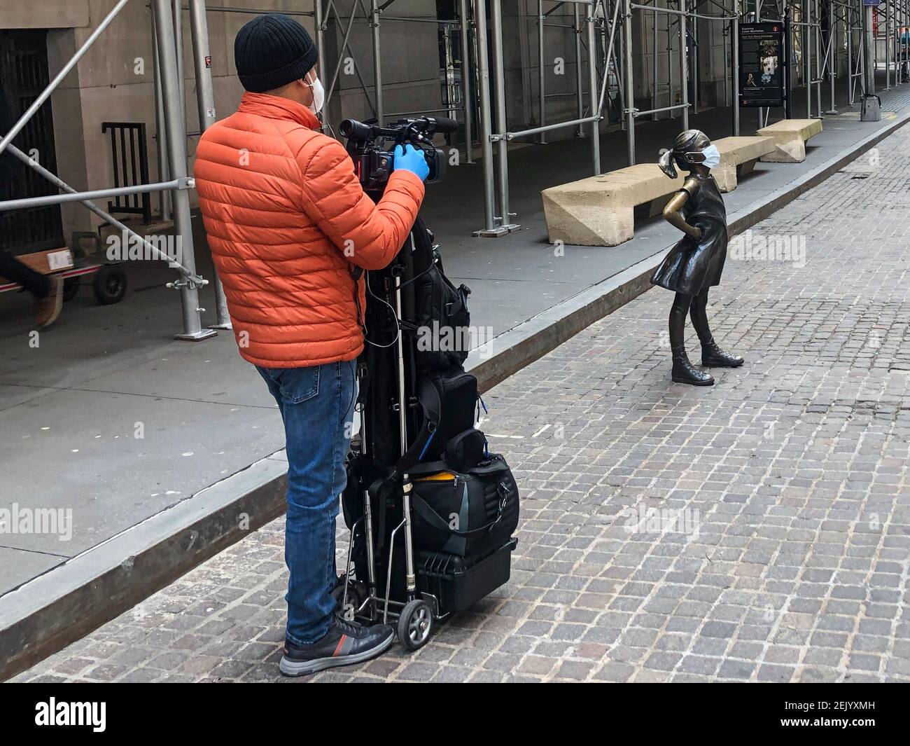 The Fearless Girl sculpture by Kristen Visbal is seen in front of the ...