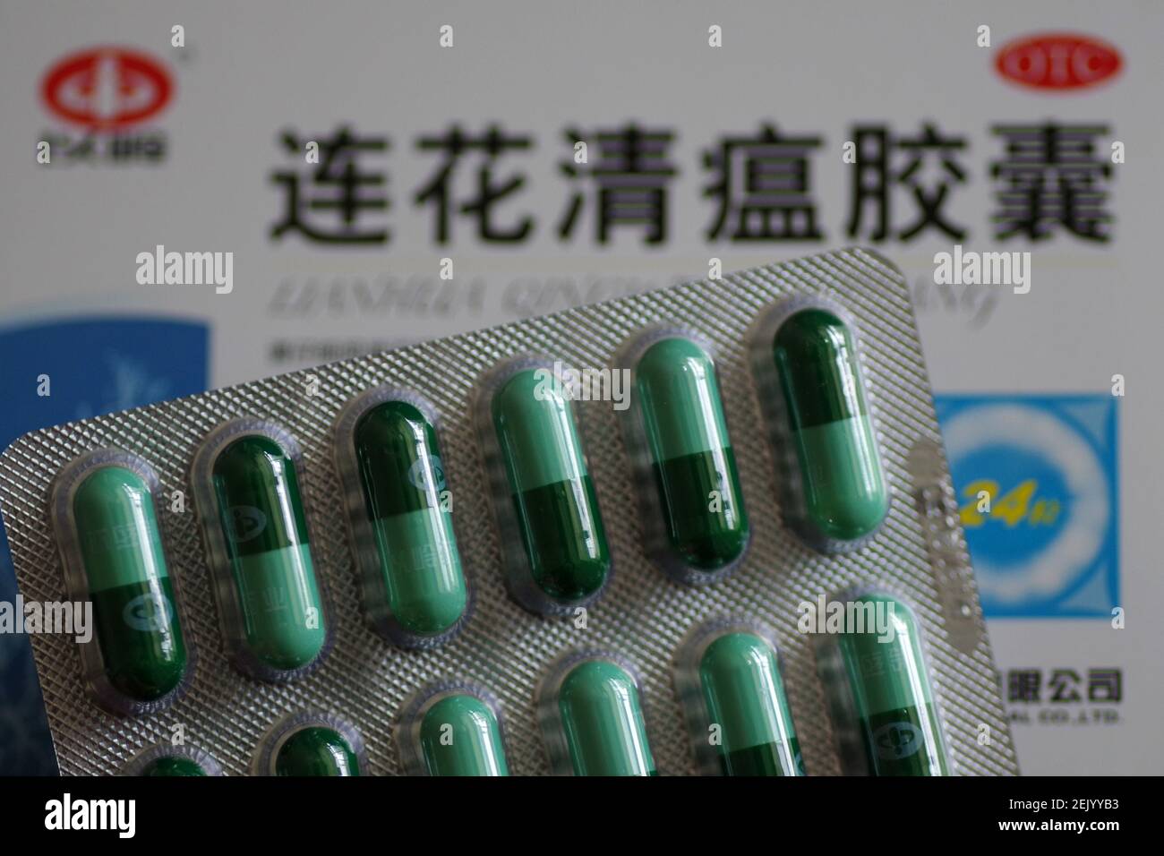 In this unlocated photo, a box of Lianhua Qingwen capsule is seen, 14 ...
