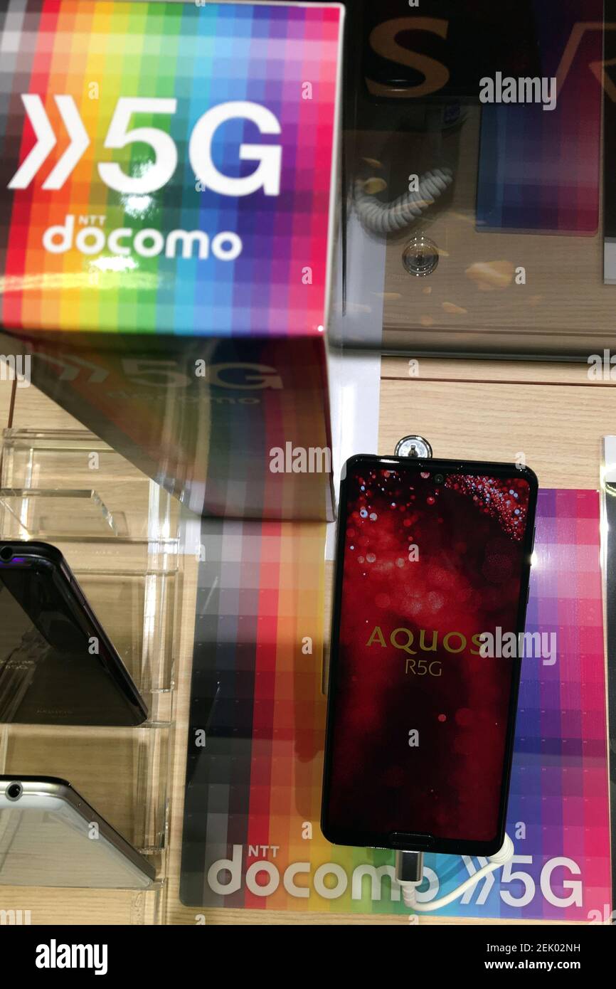 A 5G sign is pictured at NTT docomo Store at Tokyo's Ginza shopping ...