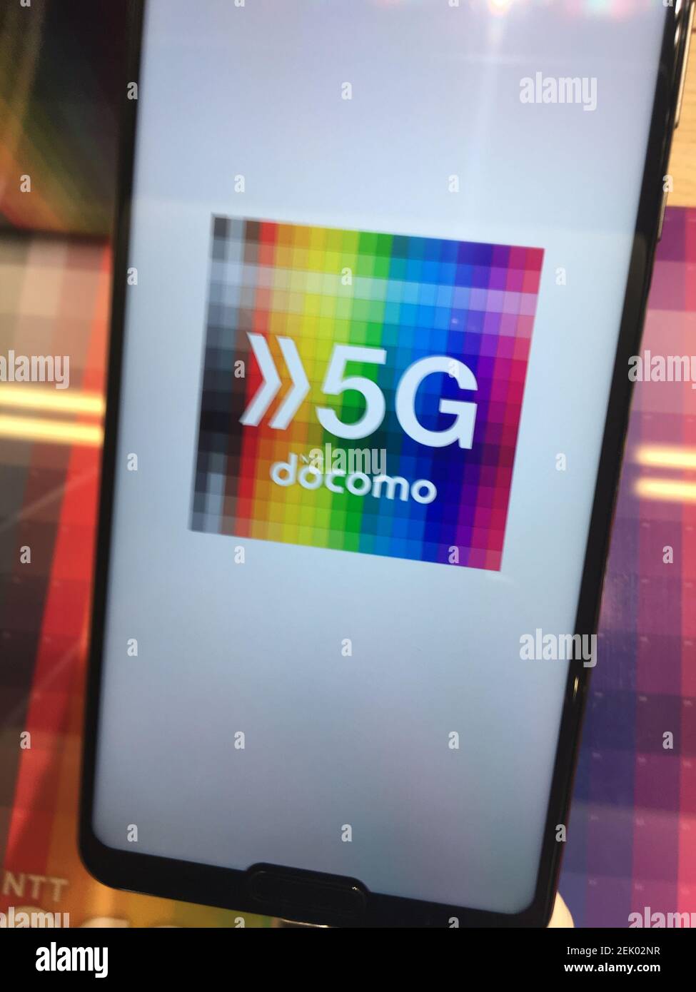 A 5G sign is pictured at NTT docomo Store at Tokyo's Ginza shopping ...