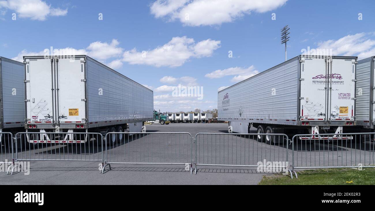 Dozens of refrigerated trucks and containers seen on Randall's Island ...