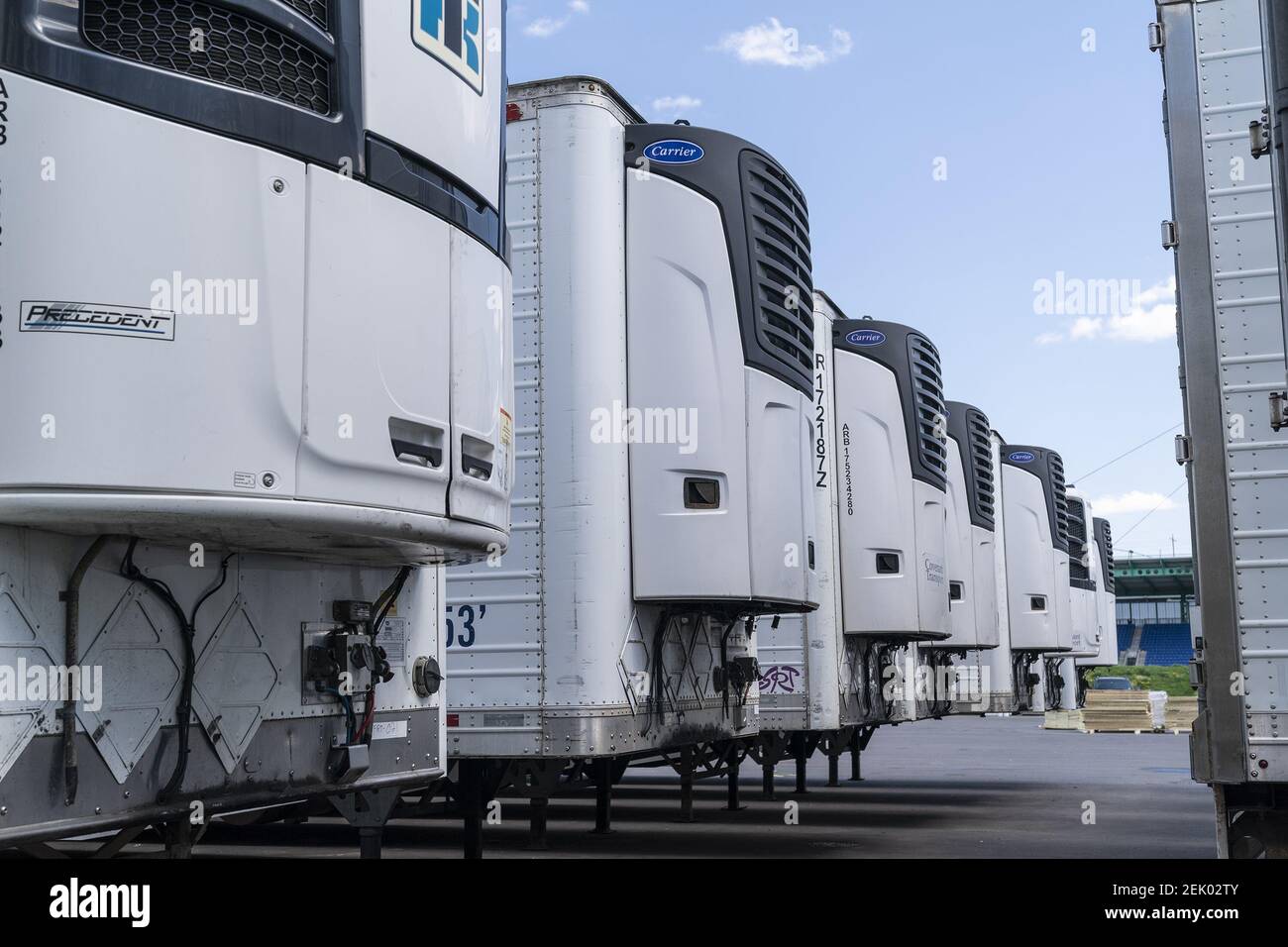 Dozens of refrigerated trucks and containers seen on Randall's Island ...