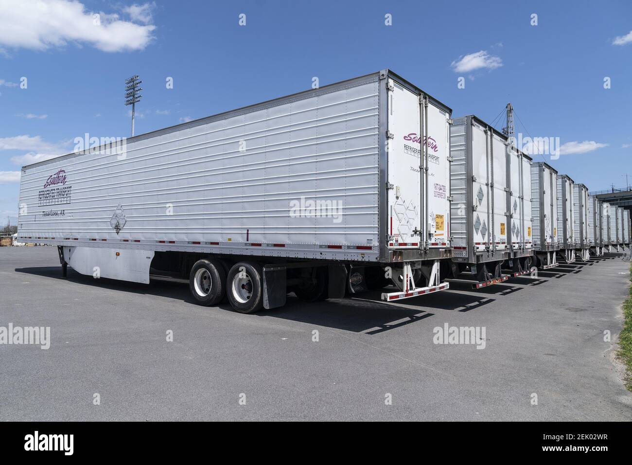Dozens of refrigerated trucks and containers seen on Randall's Island ...