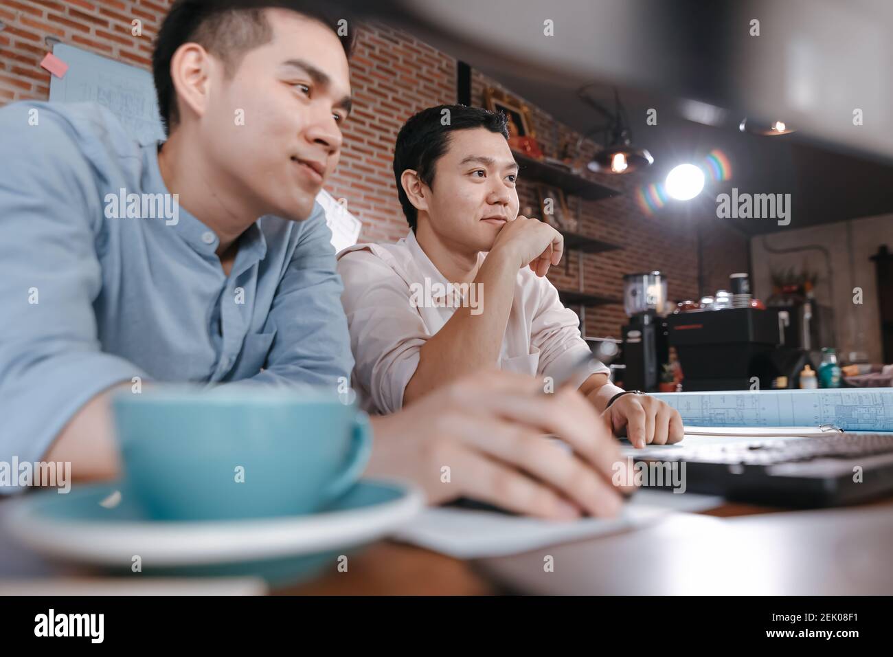 engineers and architect reading building and drawing outlay ...