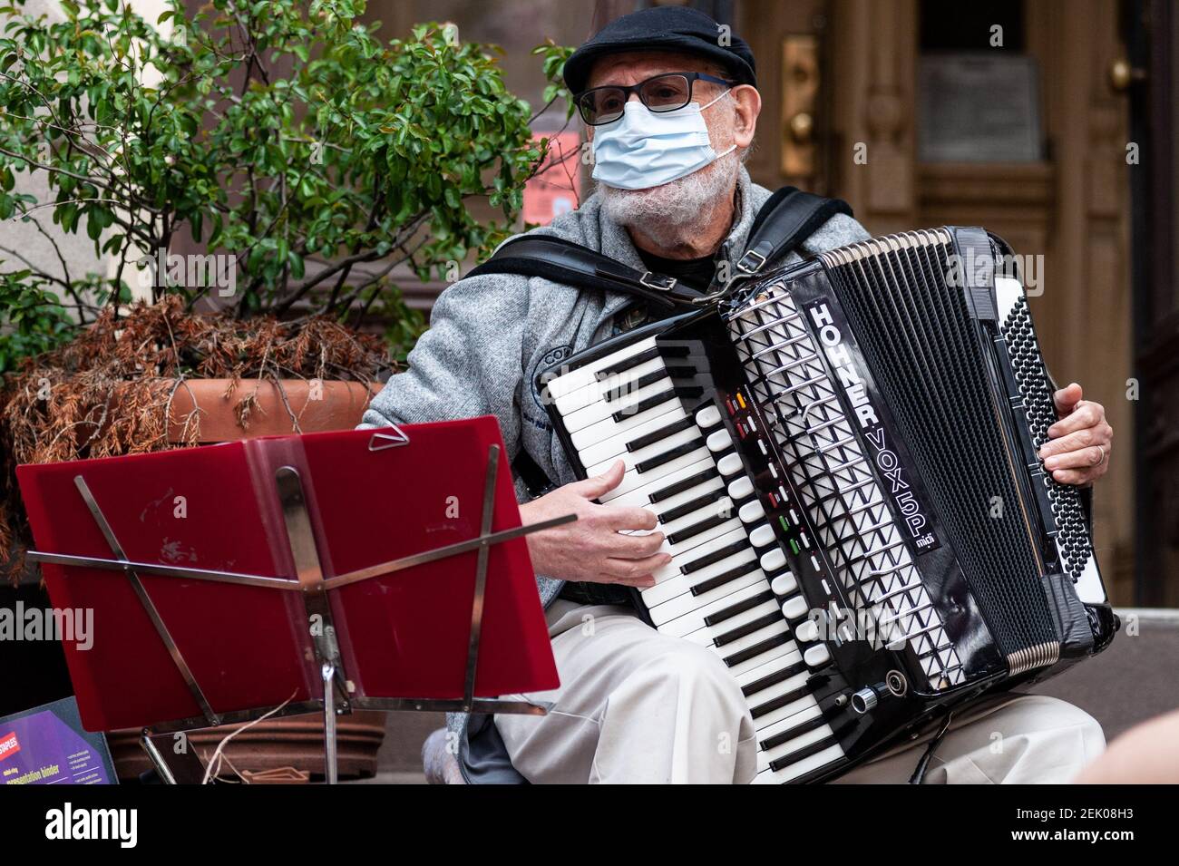 Park Sloper Mark Nathanson plays the accordion brightening the day for neighbors and passerby's ...
