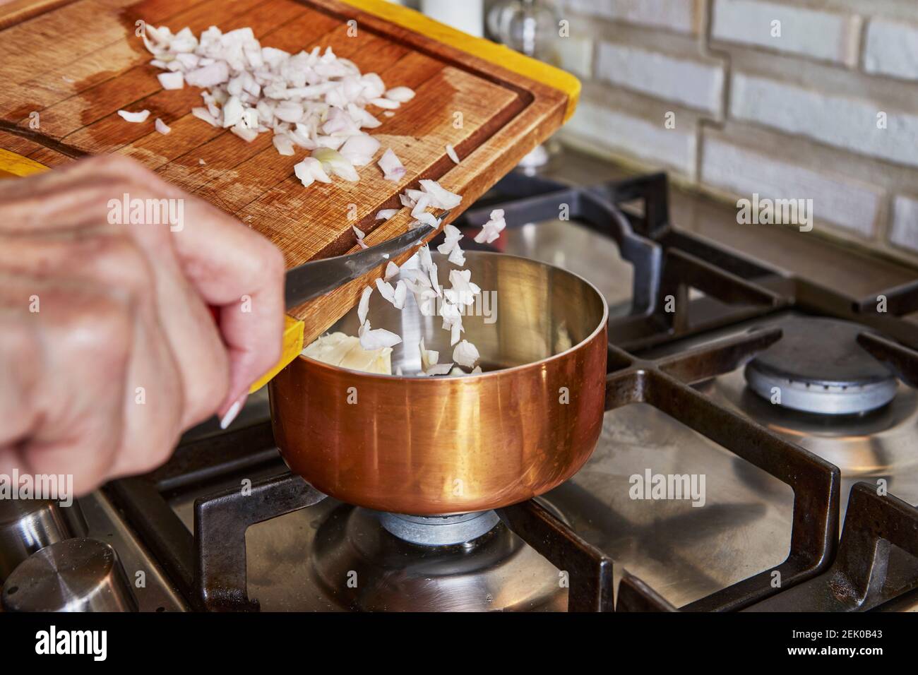 Cooking at home in the kitchen according to recipe from the Internet ...