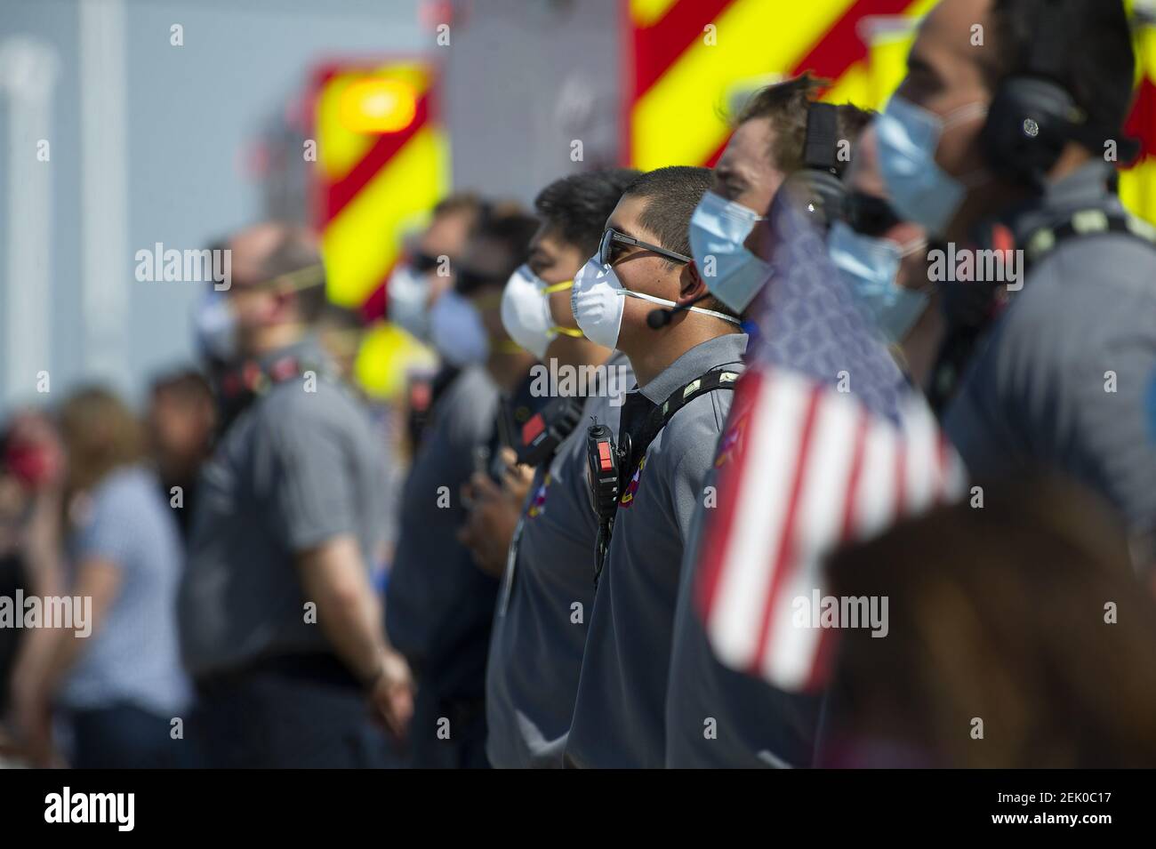 Firefighters with the Buda Fire Department stand at attention during ...