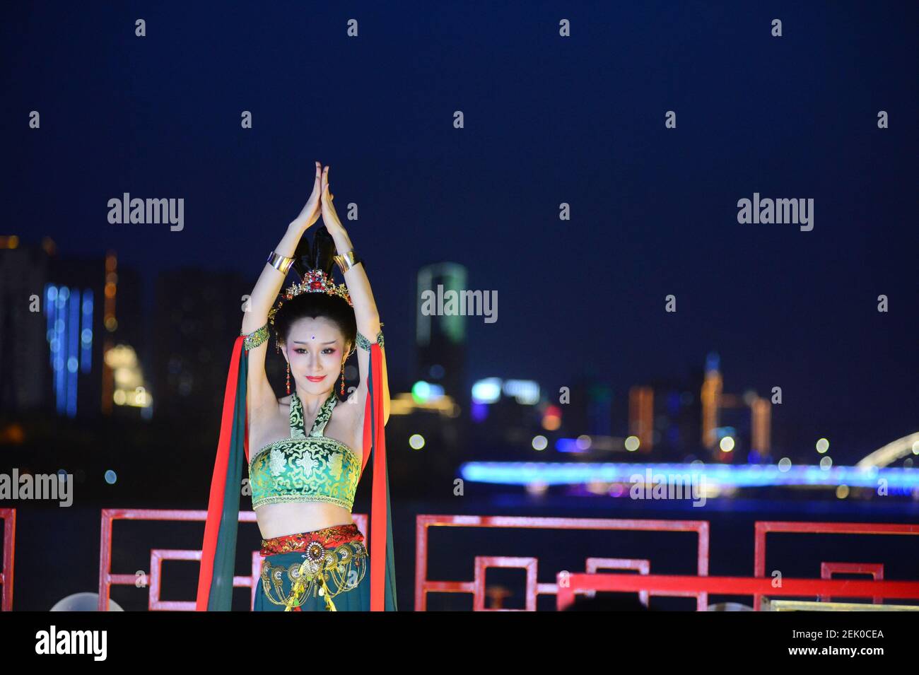 A performer plays Dunhuang Flying Apsaras Dance, which drew inspiration ...