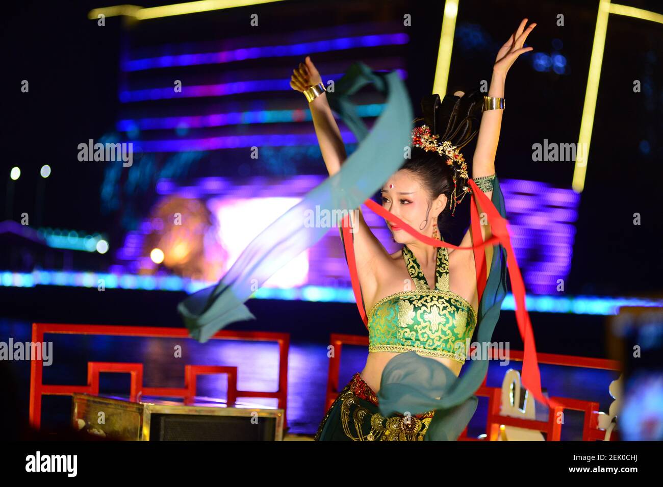 A performer plays Dunhuang Flying Apsaras Dance, which drew inspiration ...