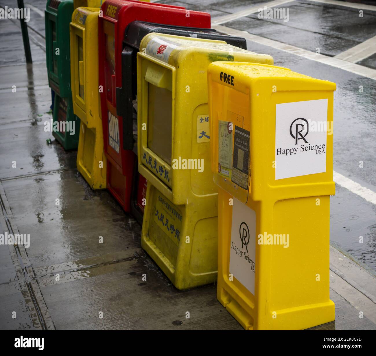 A collection of newspaper distribution boxes in Chelsea in New York ...