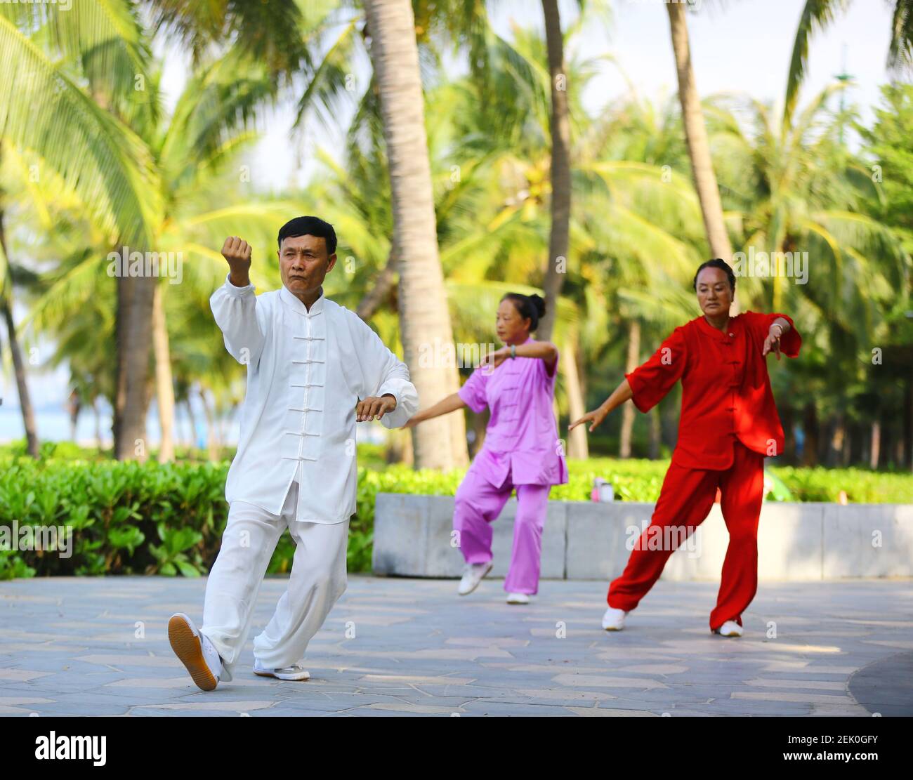 Citizens do morning exercise at the seaside to improve health condition ...