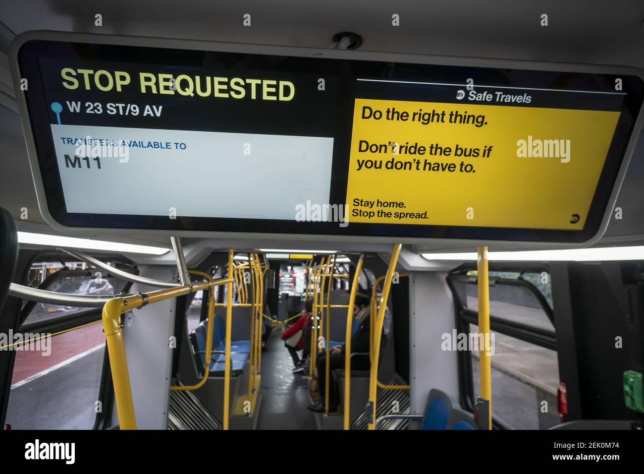 Masked riders in the SBS 23 bus on 23rd street in New York on Friday ...