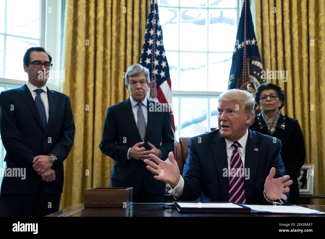 President Donald Trump participates in a signing ceremony for H.R.266 ...