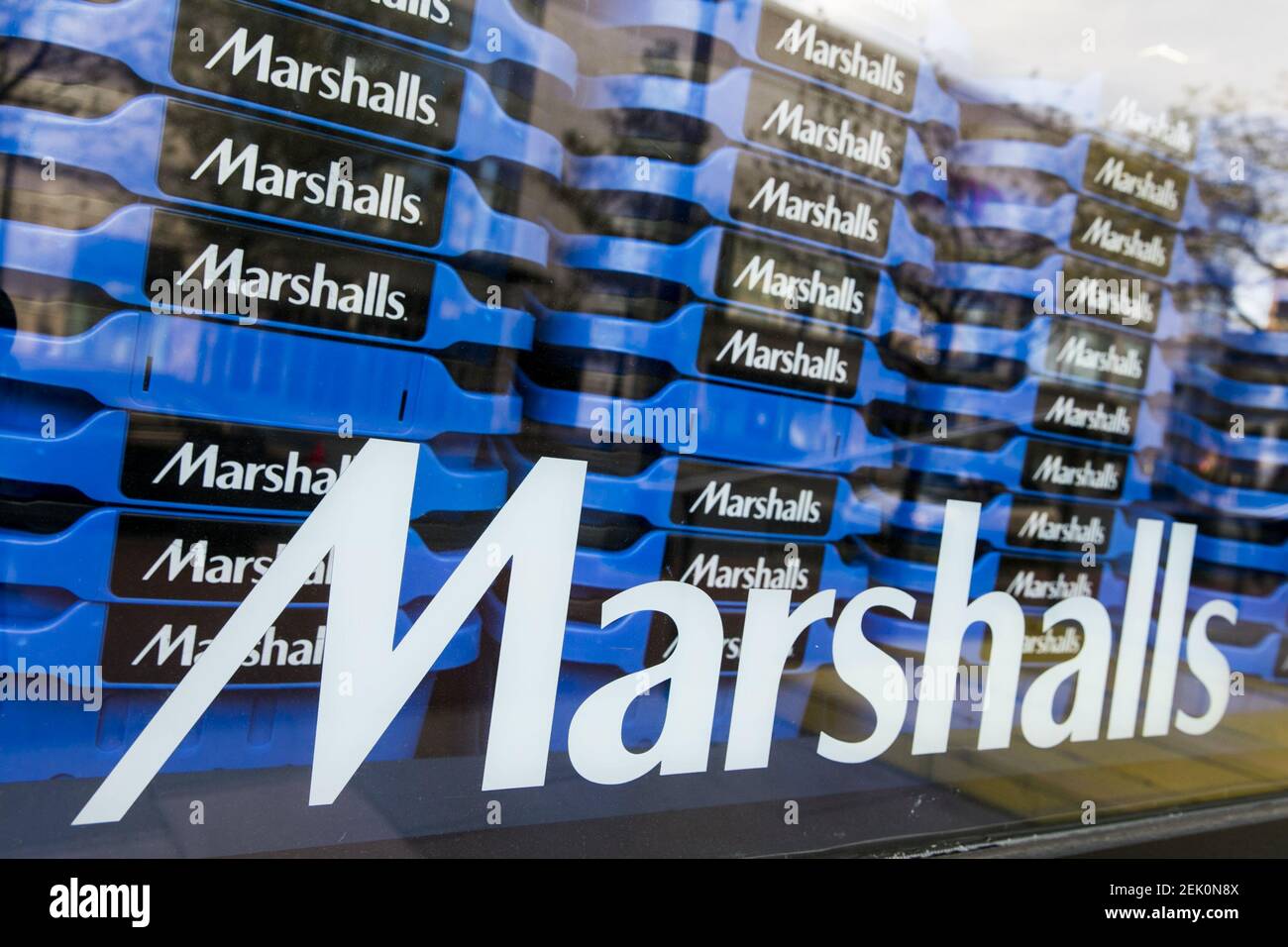 A logo sign outside of a Marshalls retail store location in Washington ...