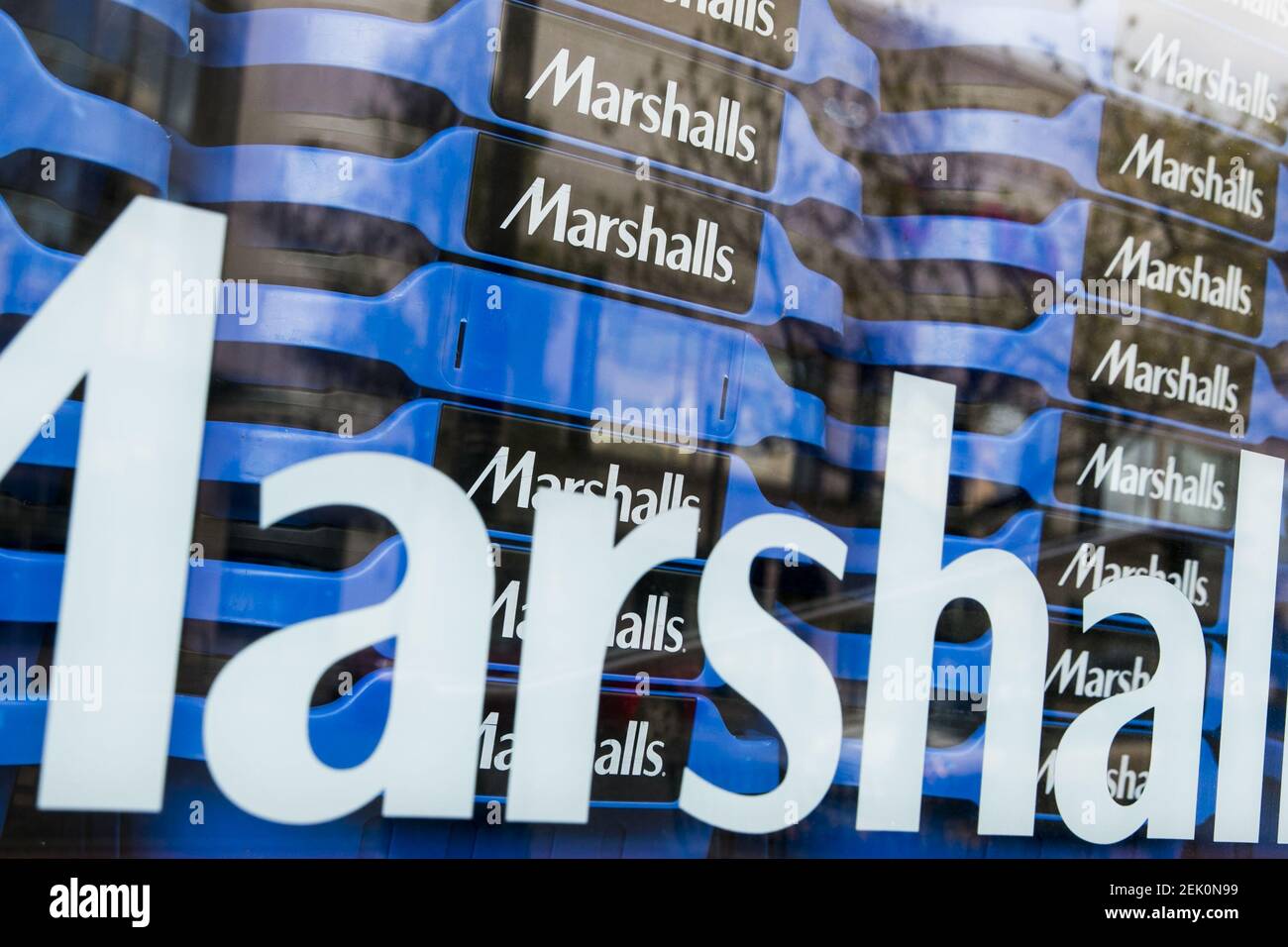 A logo sign outside of a Marshalls retail store location in Washington ...