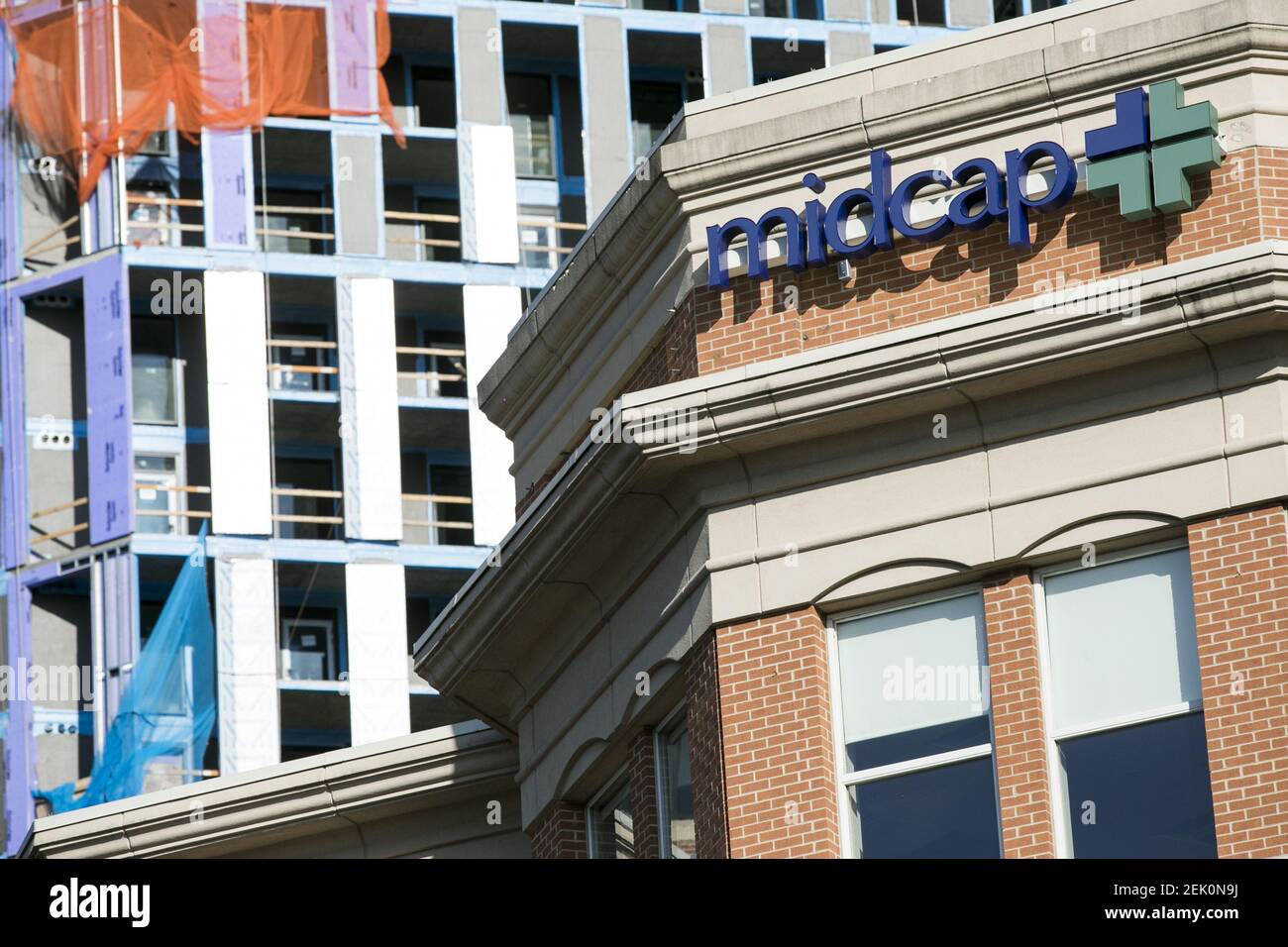 A logo sign outside of the headquarters of MidCap Financial Services in ...