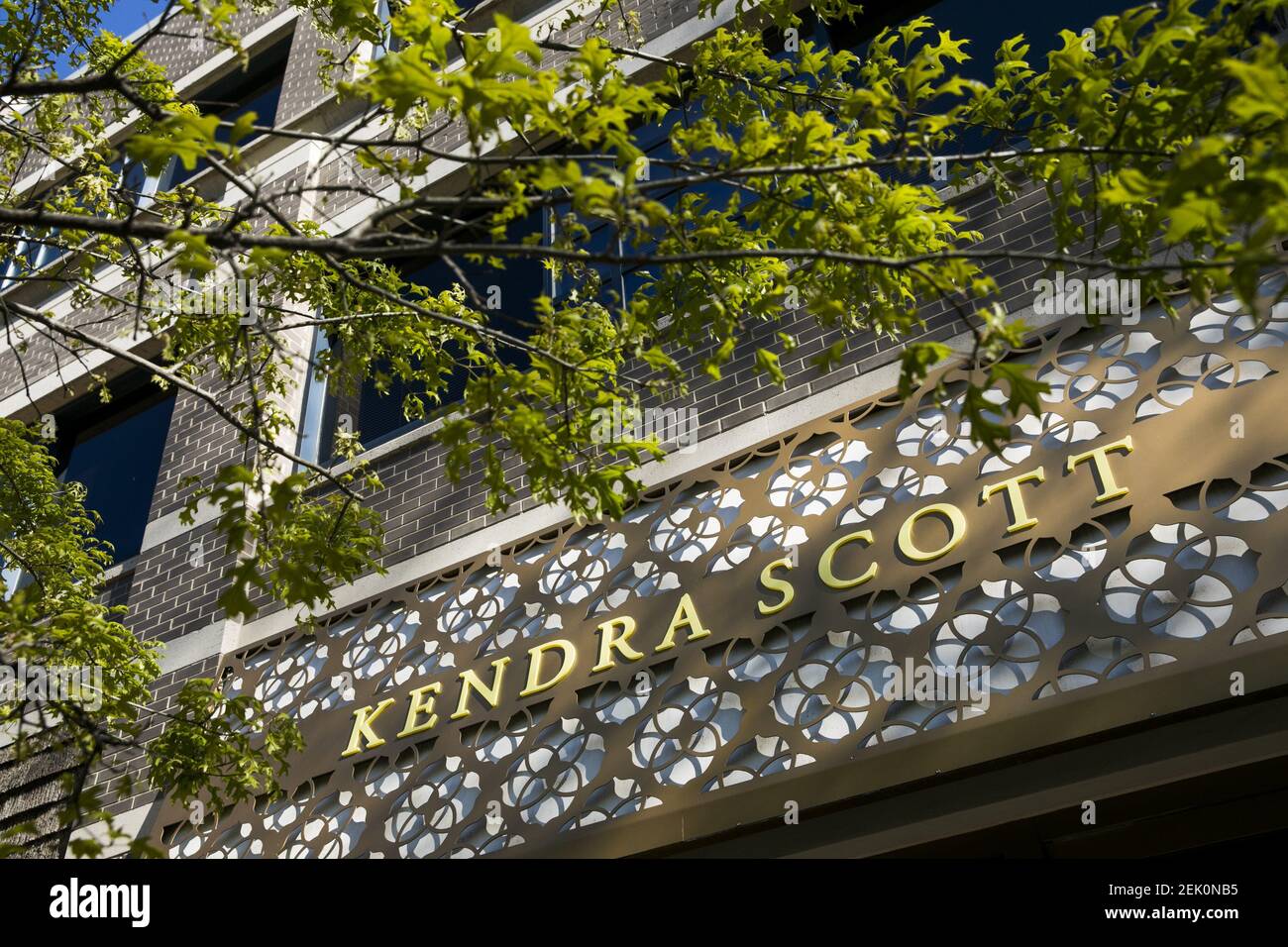 A logo sign outside of a Kendra Scott retail store location in Bethesda ...