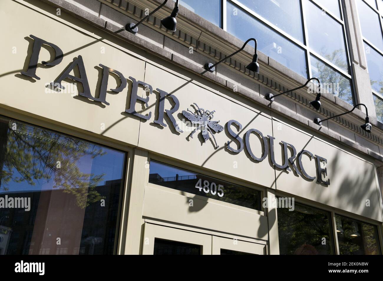 A logo sign outside of a Paper Source retail store location in Bethesda ...