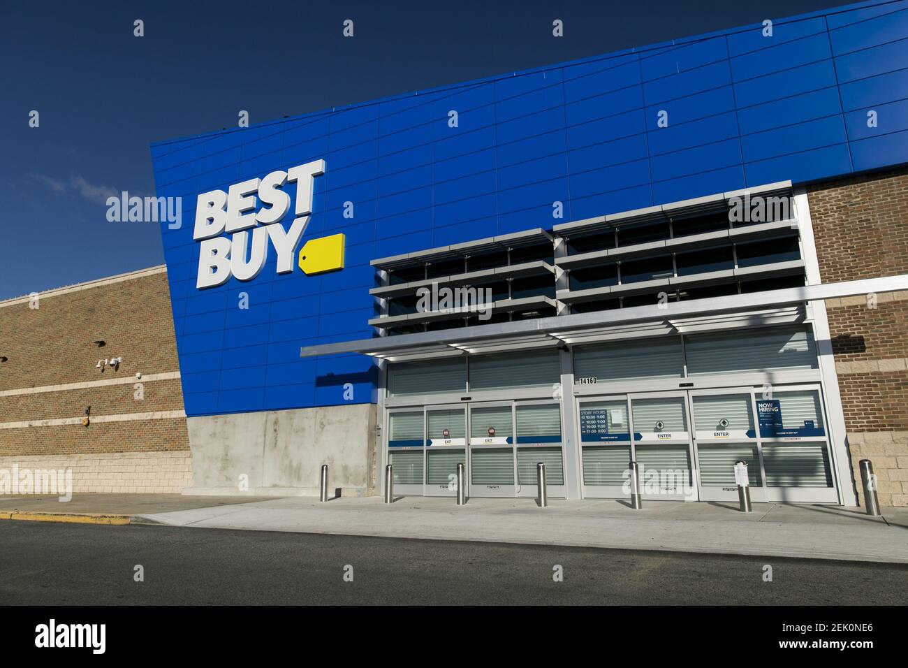 A logo sign outside of a Best Buy retail store location in Laurel ...