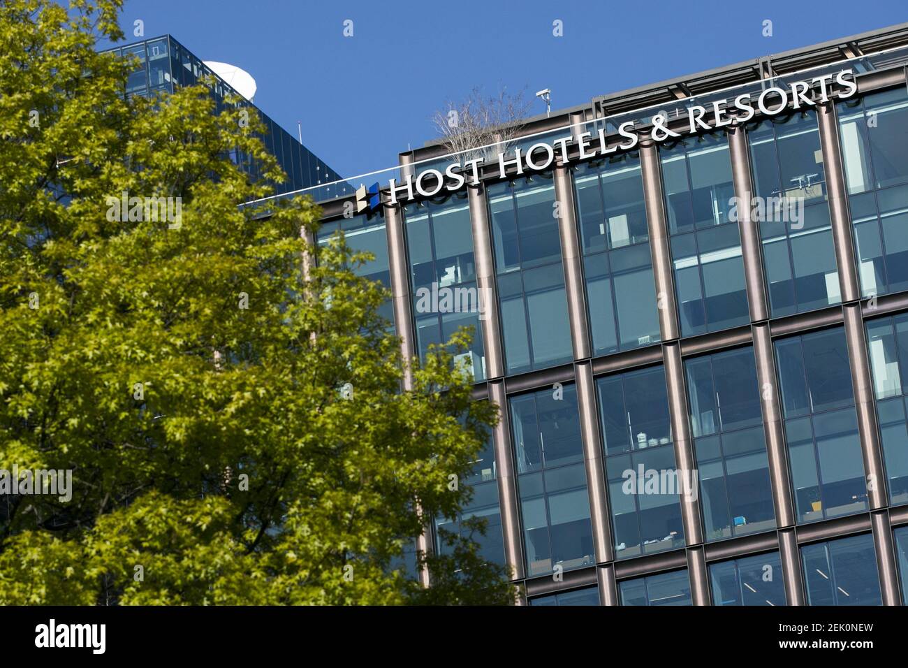 A logo sign outside of the headquarters of Host Hotels & Resorts in ...