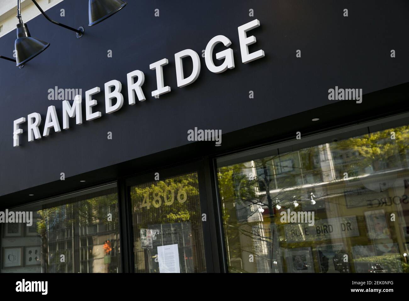 A logo sign outside of a Framebridge retail store location in Bethesda ...