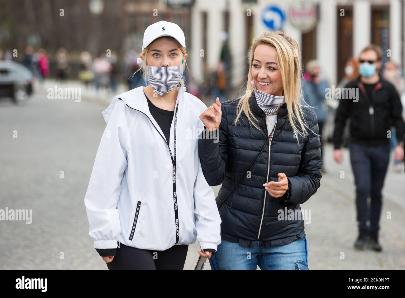 Women wear face masks as they take part during the demonstration ...