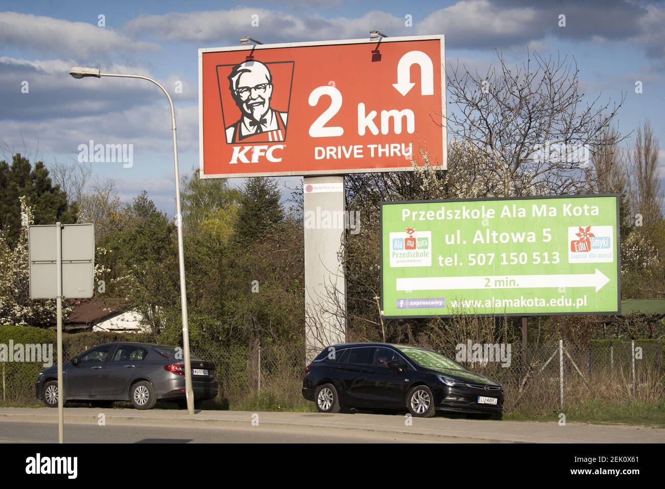 A billboard advertising for a Kentucky Fried Chicken restaurant is seen ...
