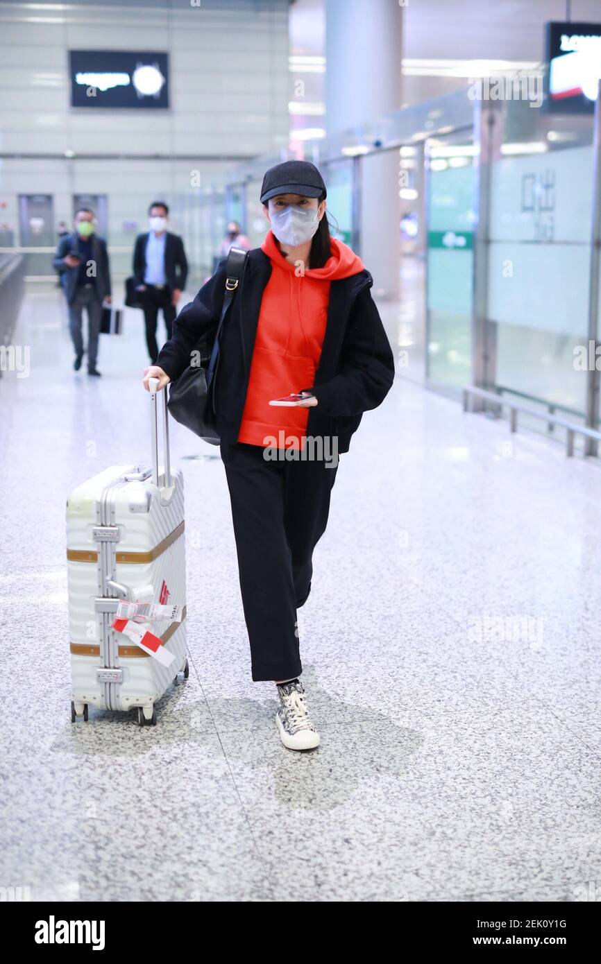 Chinese actress Liu Mintao shows up at a Shanghai airport after landing ...