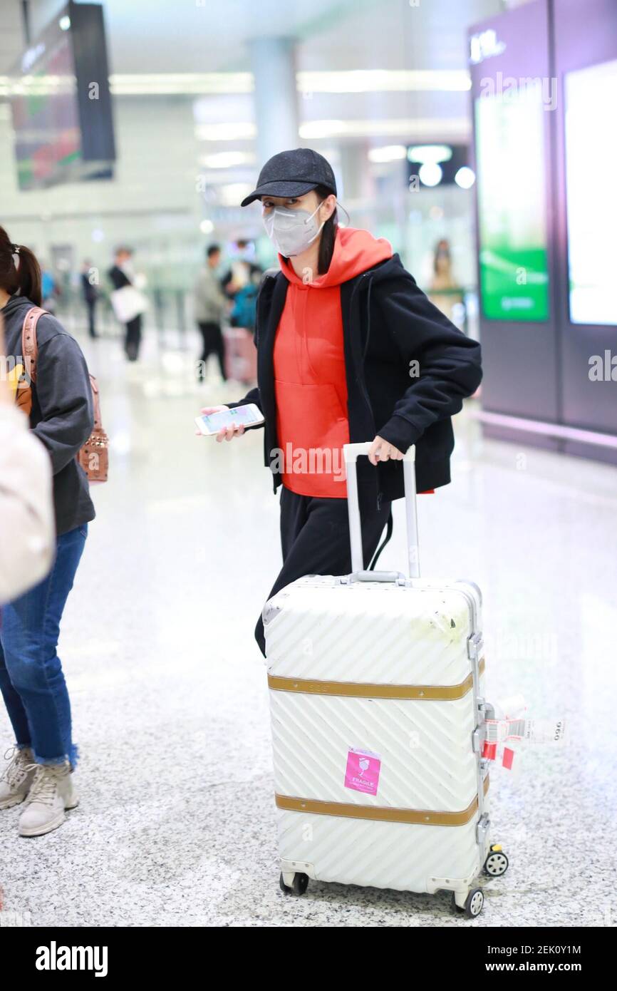 Chinese actress Liu Mintao shows up at a Shanghai airport after landing ...