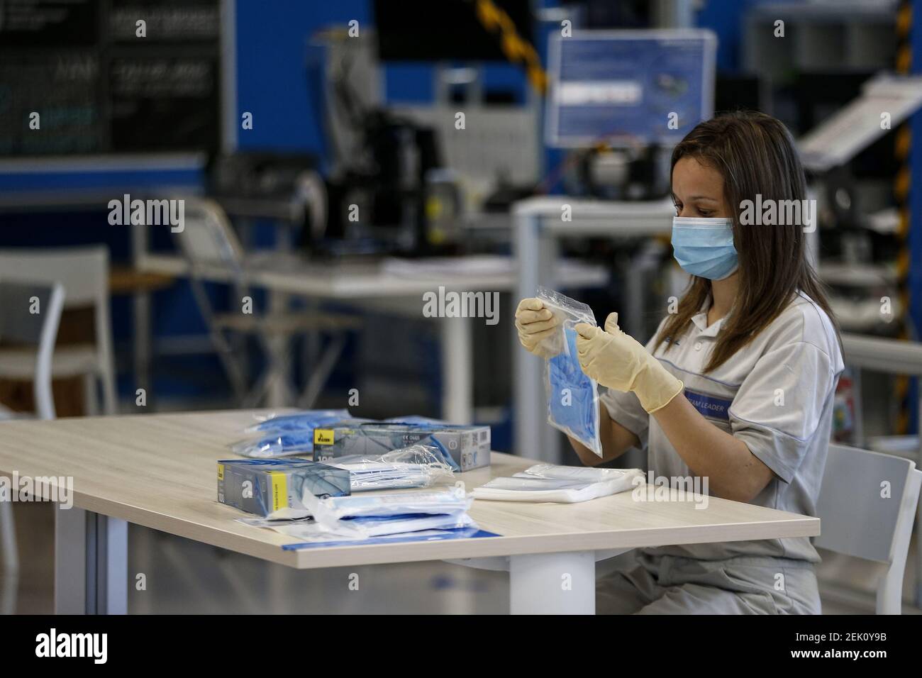Packaging of the safety kit with security facial mask and gloves during ...