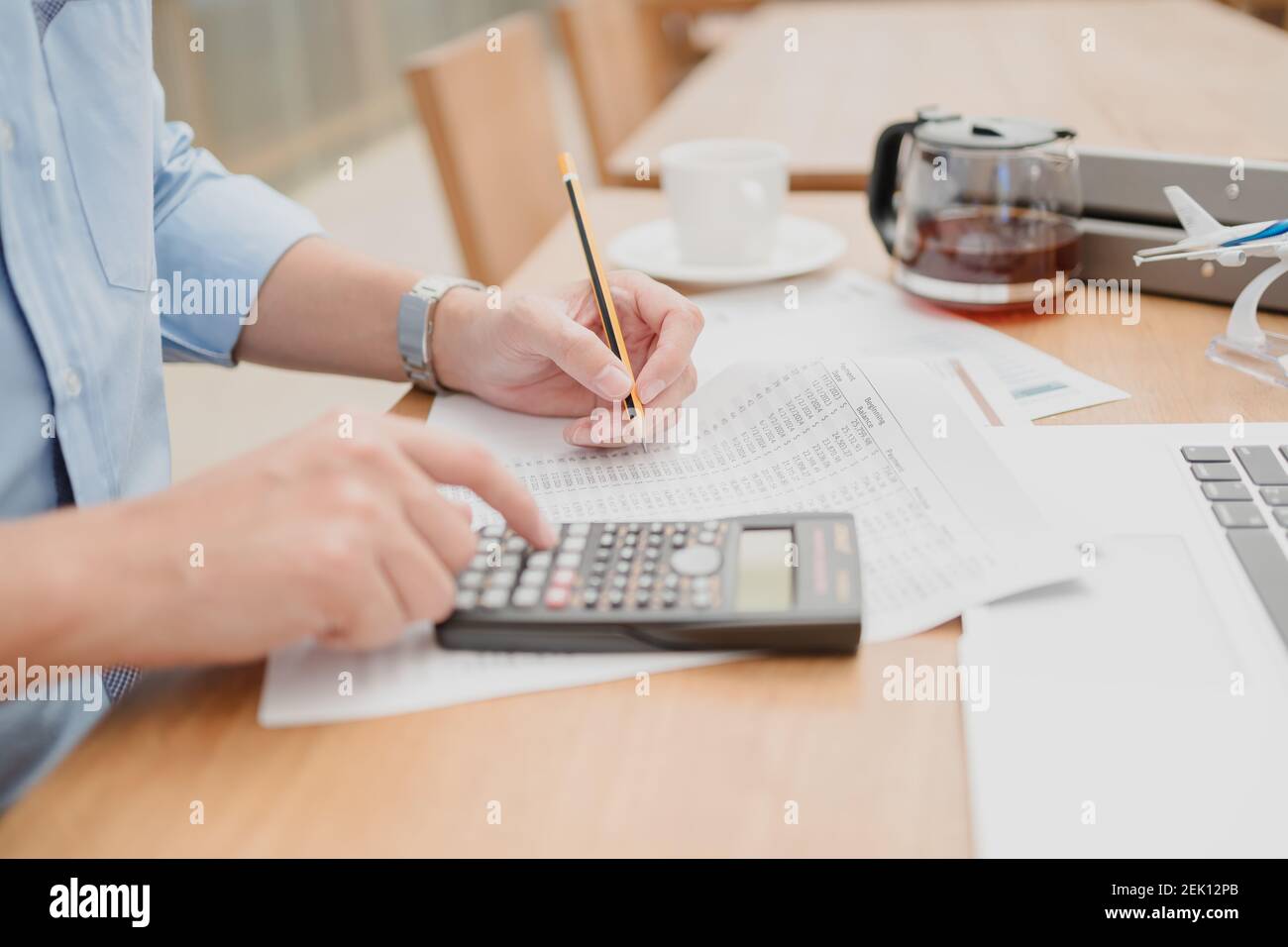 Businessman using calculator pencil hi-res stock photography and images ...