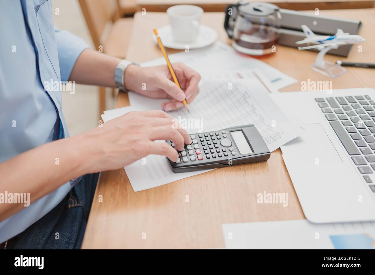 businessman using calculator for calculate budget accountancy, business ...