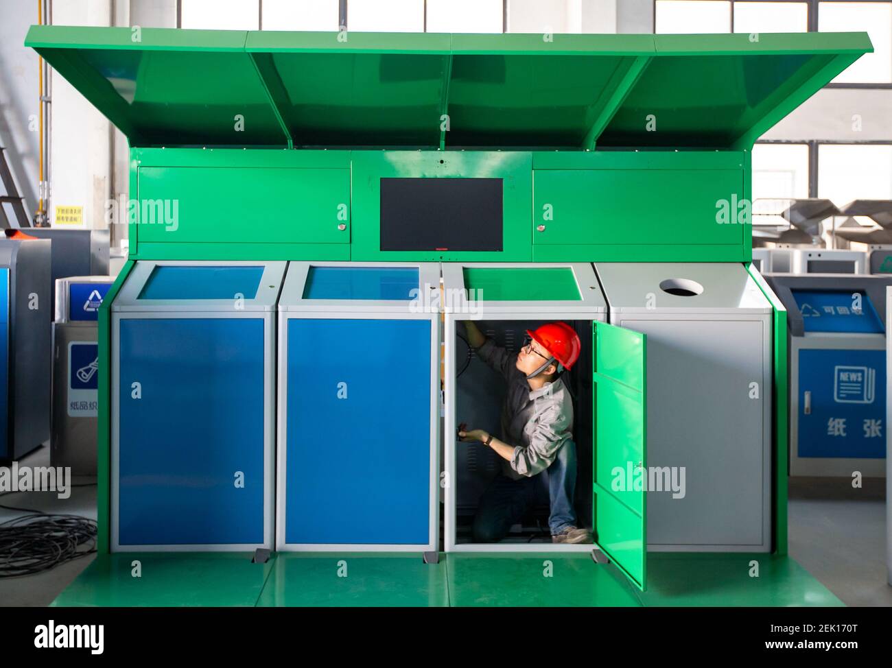 HAIAN, CHINA - APRIL 30, 2020 - A worker assembles garbage bins in a ...