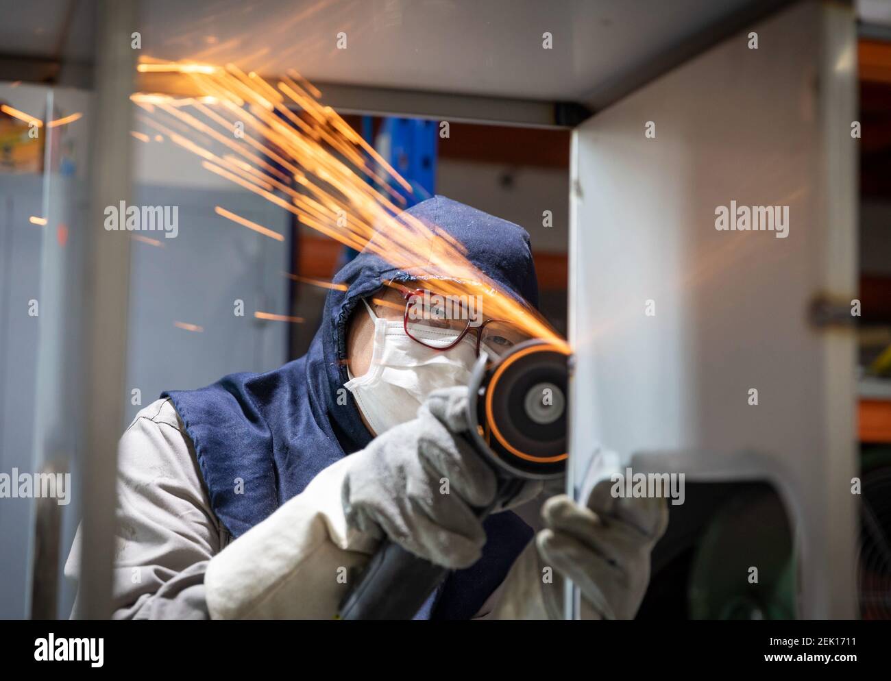 HAIAN, CHINA - APRIL 30, 2020 - A worker assembles garbage bins in a ...