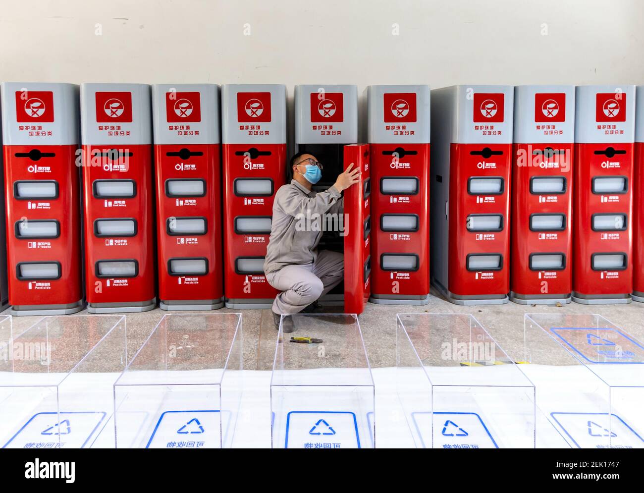 HAIAN, CHINA - APRIL 30, 2020 - A worker assembles garbage bins in a ...