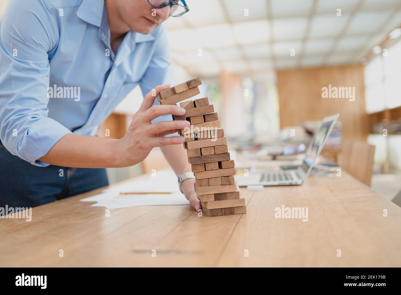 Abstract businessmen fail danger tower block game building construction ...