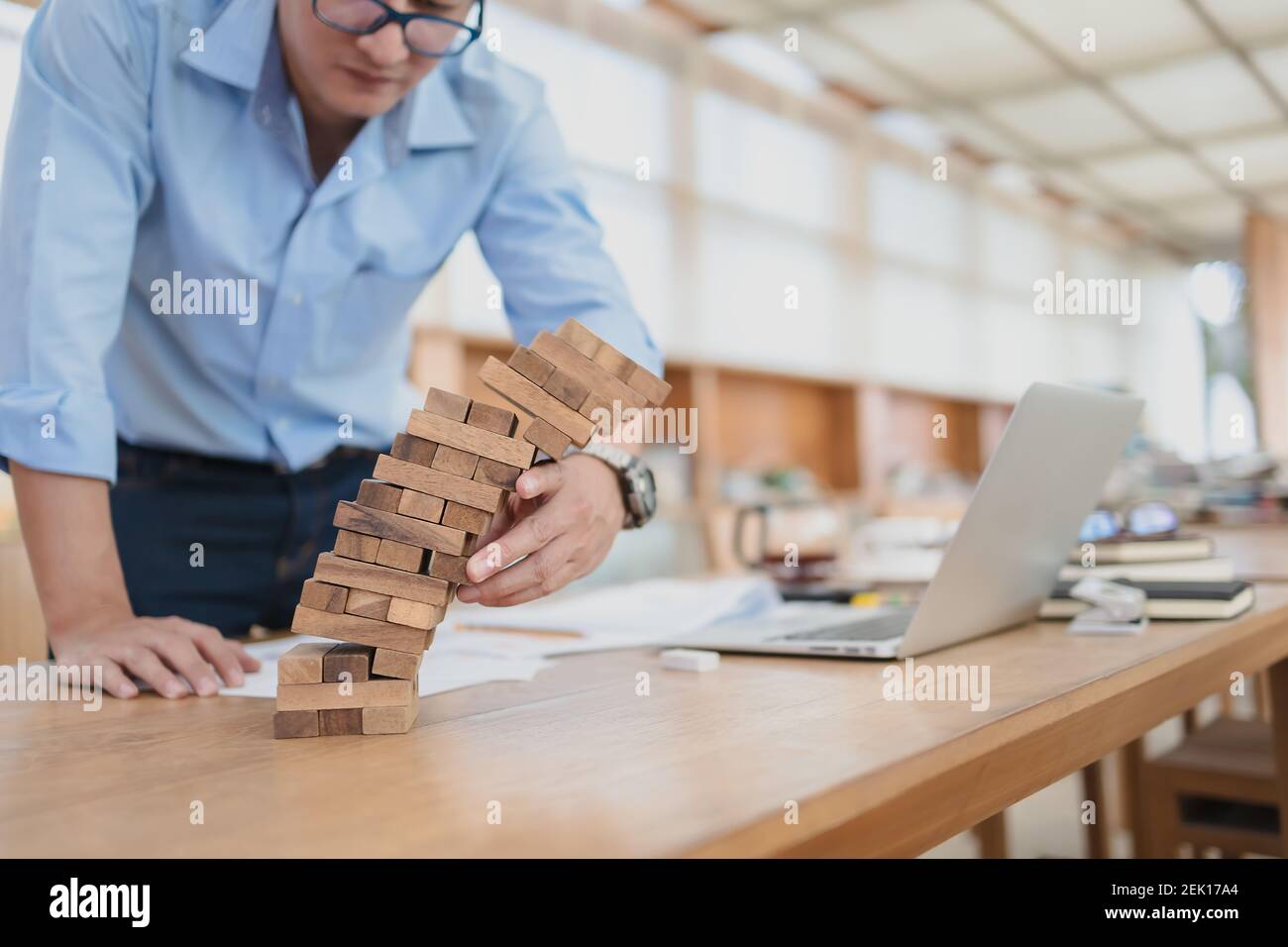 Abstract businessmen fail danger tower block game building construction ...