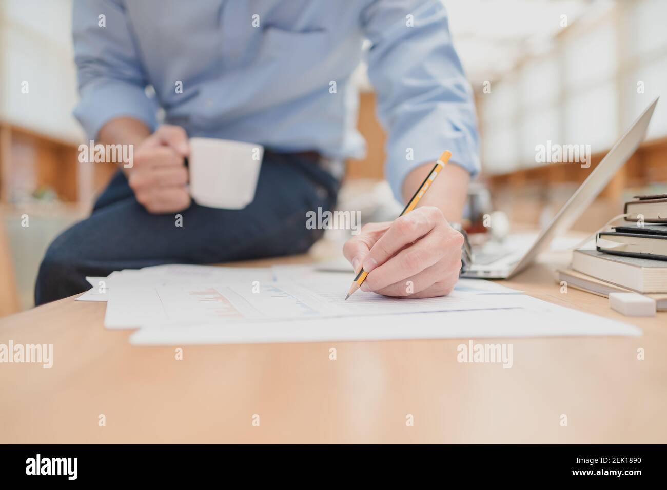 businessman using pencil checking document data calculator for ...
