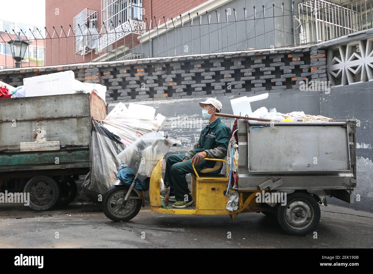 Garbage sorting staff manage and deliver garbage in Xicheng district in ...