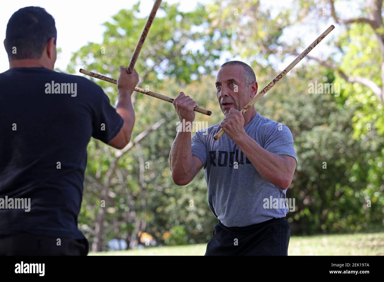 Andrew Obeidy and Victor Ortiz practice Kali, a Filipino martial art ...