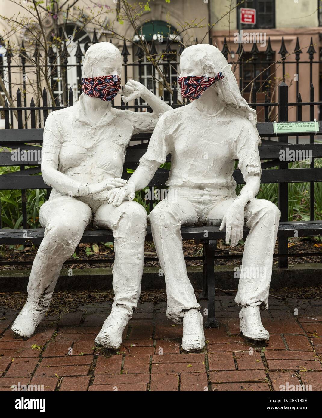 Statues of Gay Liberation Monument wearing protective facial bandanas ...
