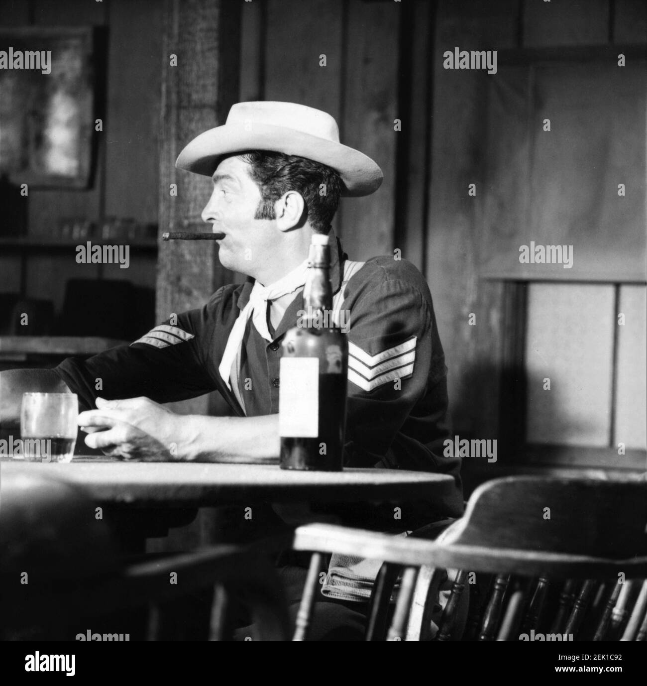 DEAN MARTIN on set candid smoking cigar and drinking whiskey during ...