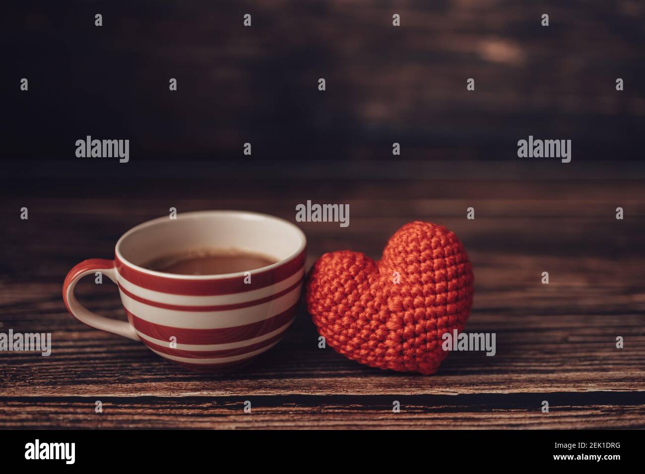 heart shape and coffee on wood table Stock Photo - Alamy