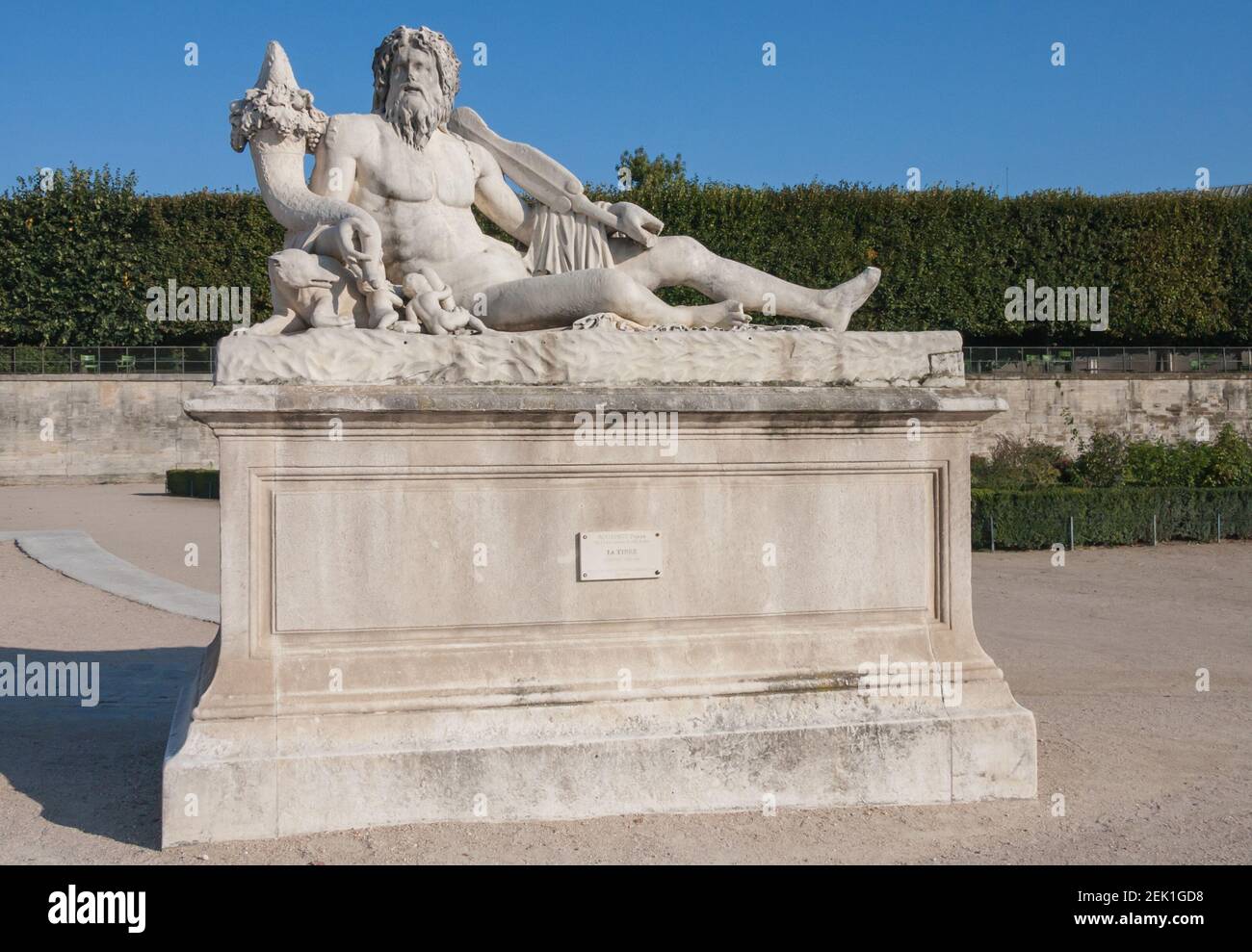 Le Tibre (The Tibor) marble statue in the Tuileries Garden on an autumn ...