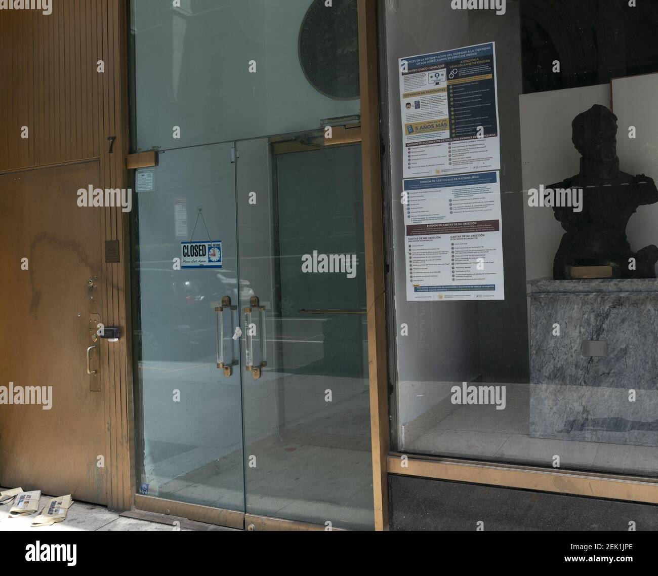 Signs on entrance doors of consulate of Venezuela during COVID-19 ...