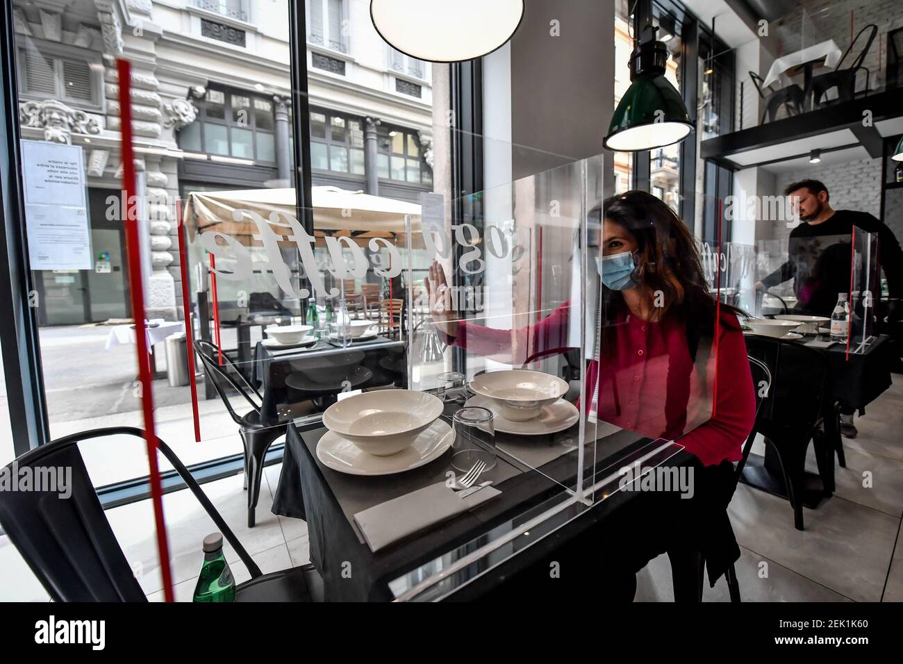 Gaga Cafe in via Giuliani with plexiglass at the tables to comply with ...