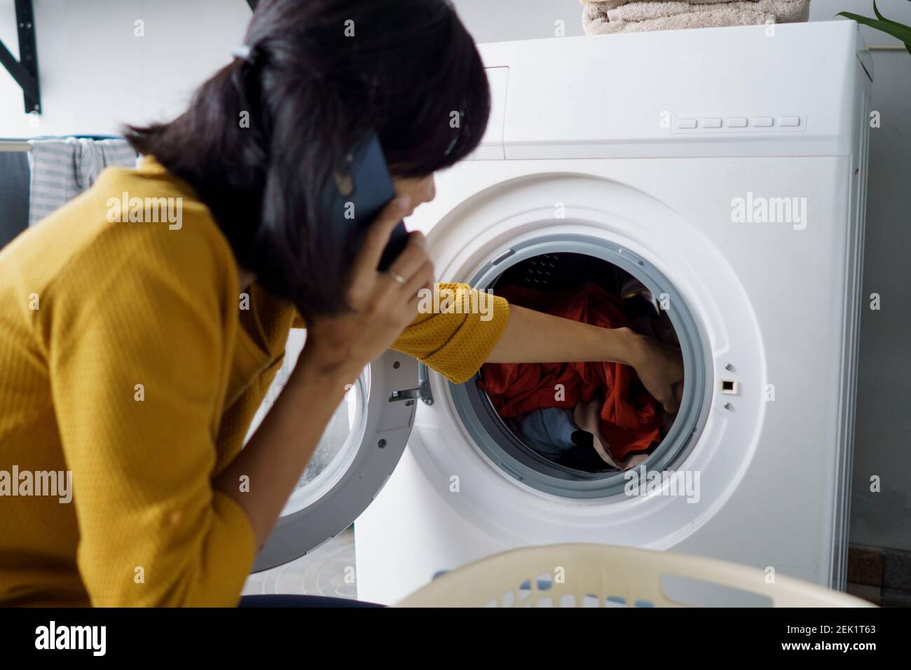 Lady Doing Laundry High Resolution Stock Photography and Images - Alamy