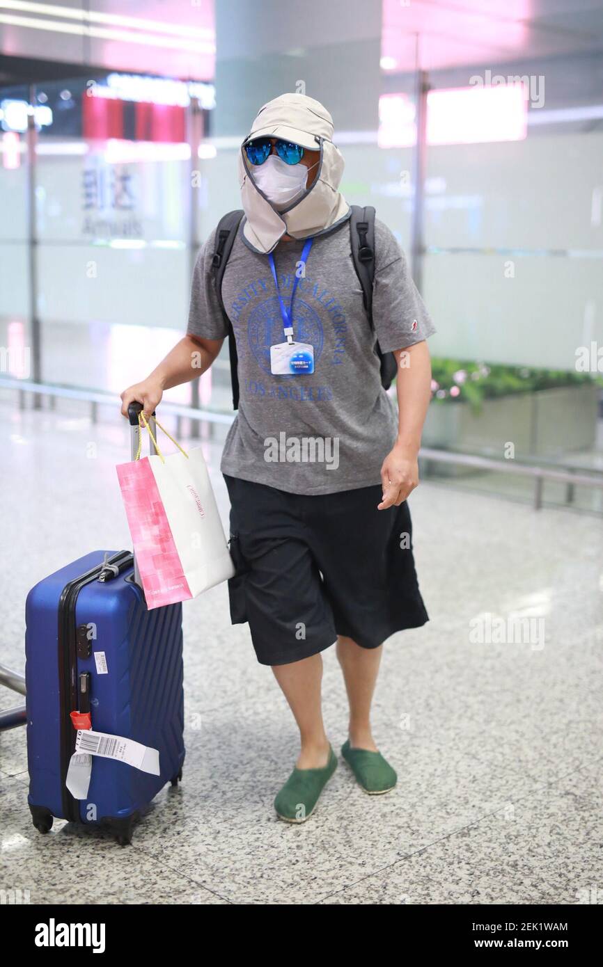 Chinese actor and director Xu Zheng shows up at a Shanghai airport ...