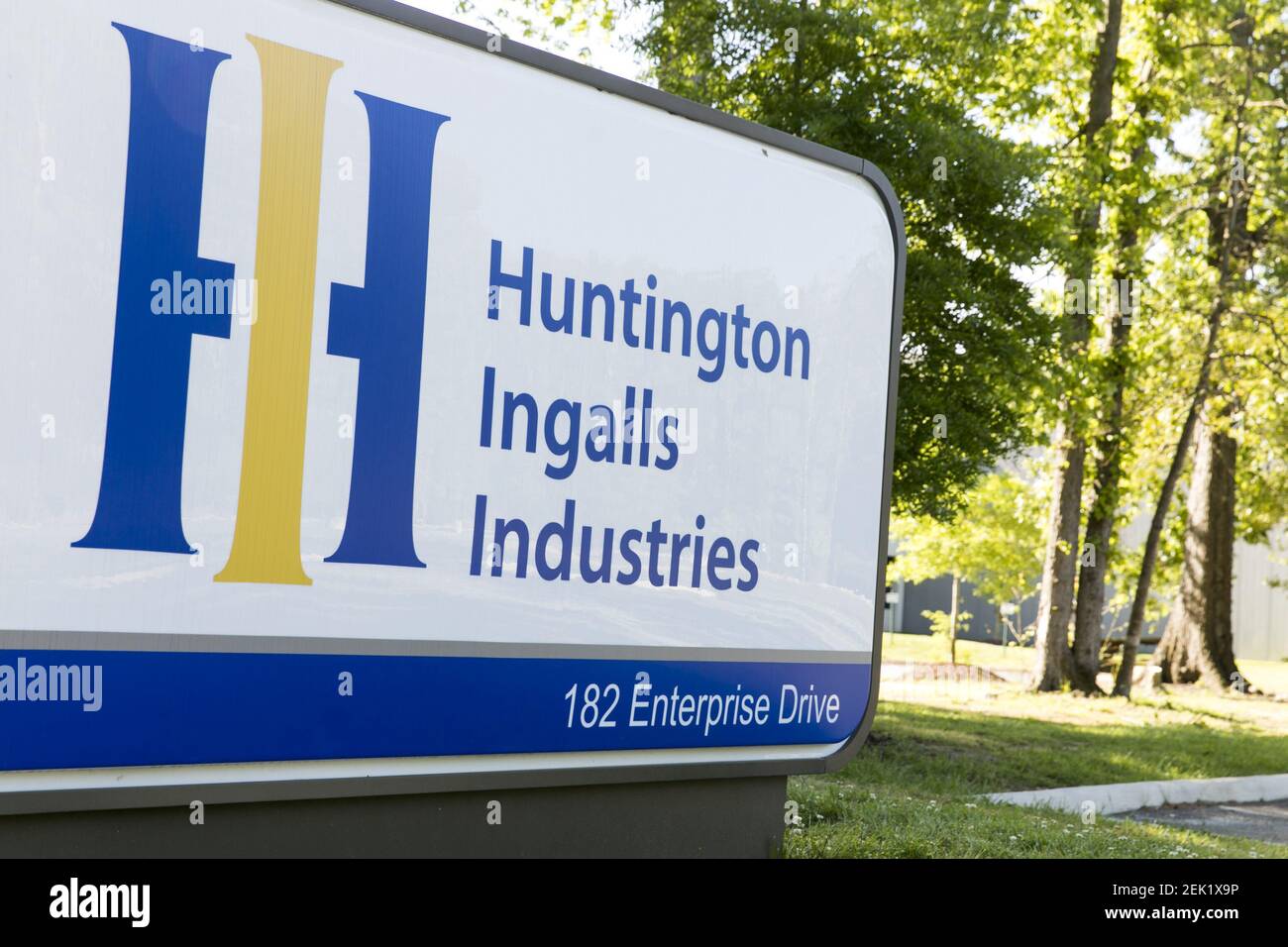 A logo sign outside of a facility occupied by Huntington Ingalls ...
