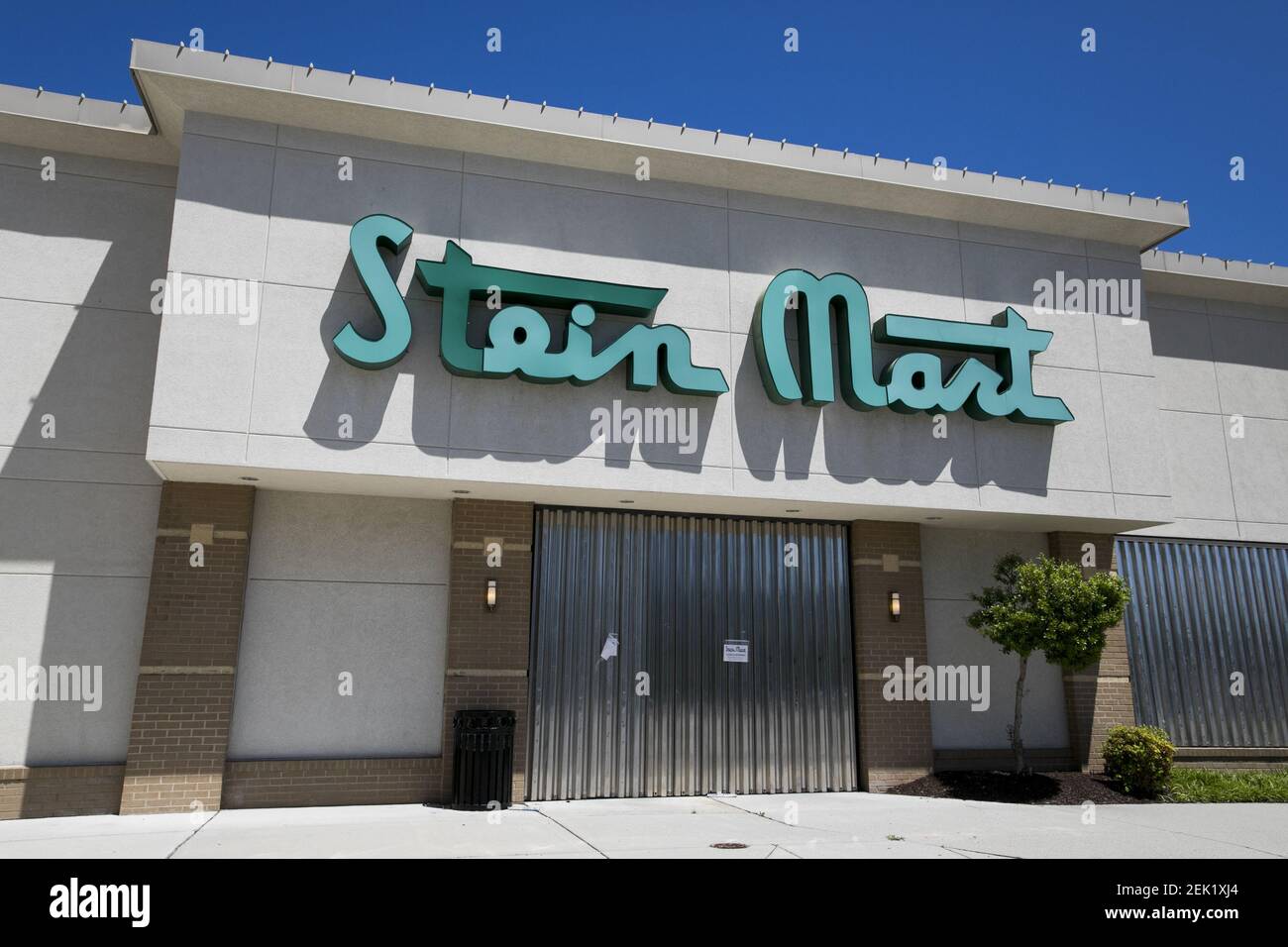 A logo sign outside of a facility occupied by Stein Mart in Virginia ...